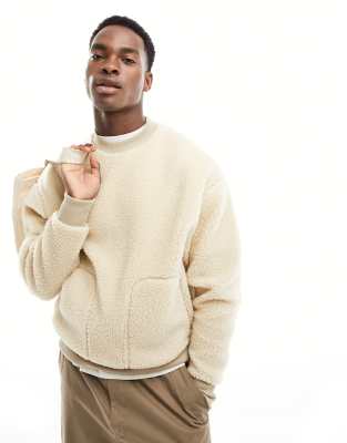 ASOS DESIGN oversized sweatshirt in off white borg with pocket detail ...