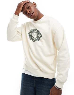 ASOS DESIGN oversized sweatshirt with lace chest print in beige | ASOS