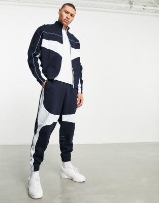 ASOS DESIGN oversized trackies in blue colour block (part of a set) | ASOS