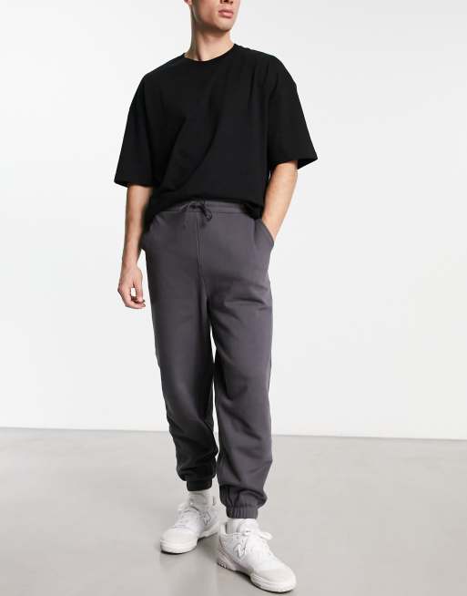 ASOS DESIGN oversized trackies in washed black | ASOS