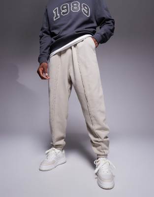 ASOS DESIGN oversized trackies with seam detail in washed beige | ASOS