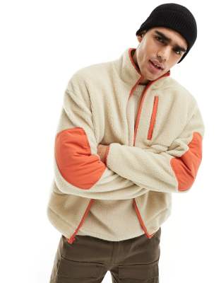 ASOS DESIGN oversized zip up track jacket with pocket detail in beige ...