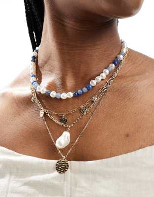 ASOS DESIGN pack of 4 necklaces with faux pearl and blue semi precious ...