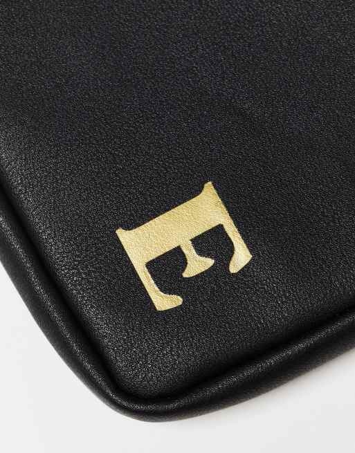 ASOS DESIGN personalised laptop case with E initial in black | ASOS