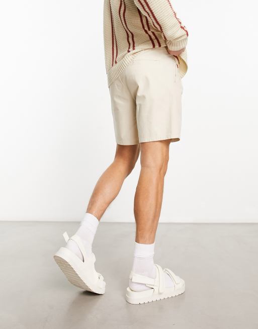 ASOS DESIGN pleated shorts in mid length in white | ASOS