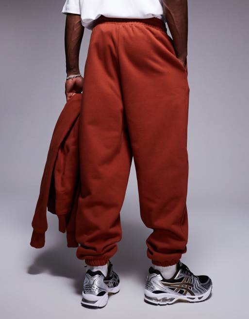 ASOS DESIGN premium heavyweight oversized trackies 400gsm in burnt red ...