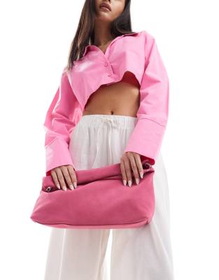ASOS DESIGN premium suede clutch bag in pink | ASOS
