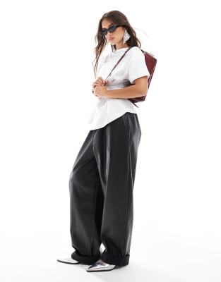 ASOS DESIGN PU turnback hem trackies in black | ASOS