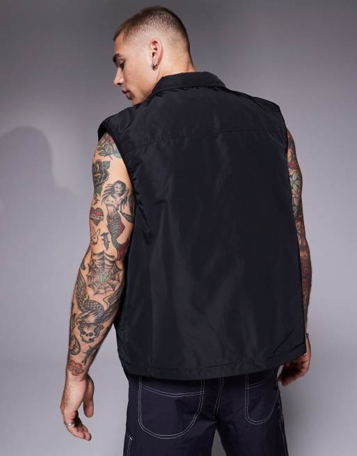 ASOS DESIGN puffer vest in black | ASOS