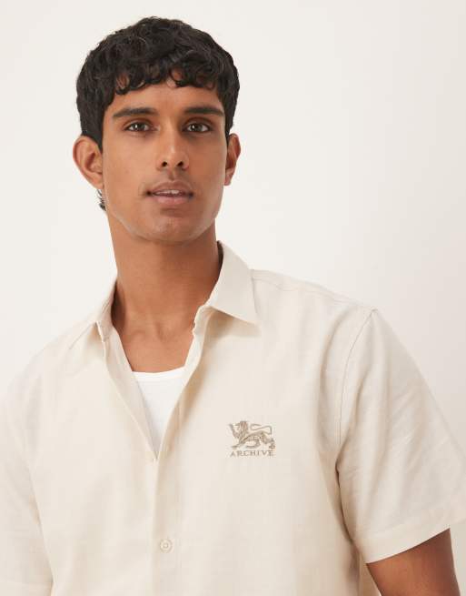ASOS DESIGN regular shirt with chest embroidery in beige | ASOS