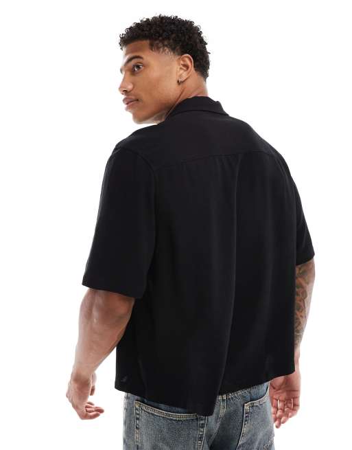 ASOS DESIGN relaxed boxy shirt with raw edge in black cotton | ASOS