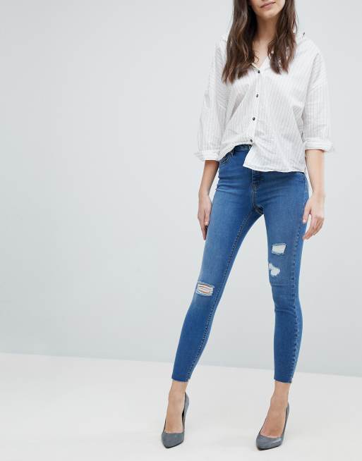 Asos Design Ridley High Waist Skinny Jeans In Pretty Mid Wash With Rip