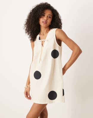 ASOS DESIGN - Robe à pois courte en lin mélangé avec détail noué à l'avant | ASOS