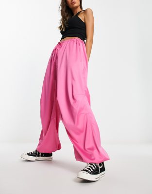ASOS DESIGN satin parachute pants in pink | ASOS