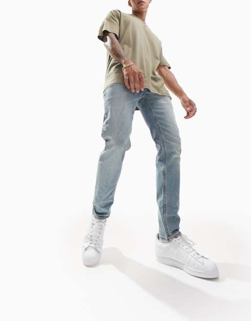 Asos Design Schmal Zulaufende Stretch Jeans In Heller Getönter