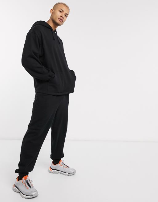 Asos Design Schwarzer Trainingsanzug Bestehend Aus Kapuzenpullover