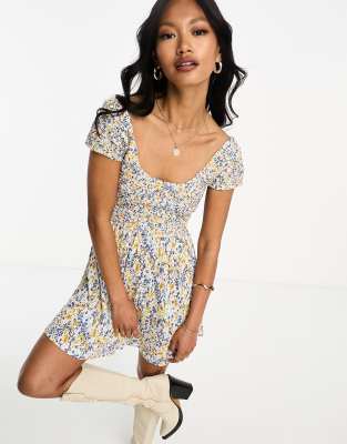 ASOS DESIGN scoop neck cap sleeve crinkle shirred mini dress in ditsy print | ASOS