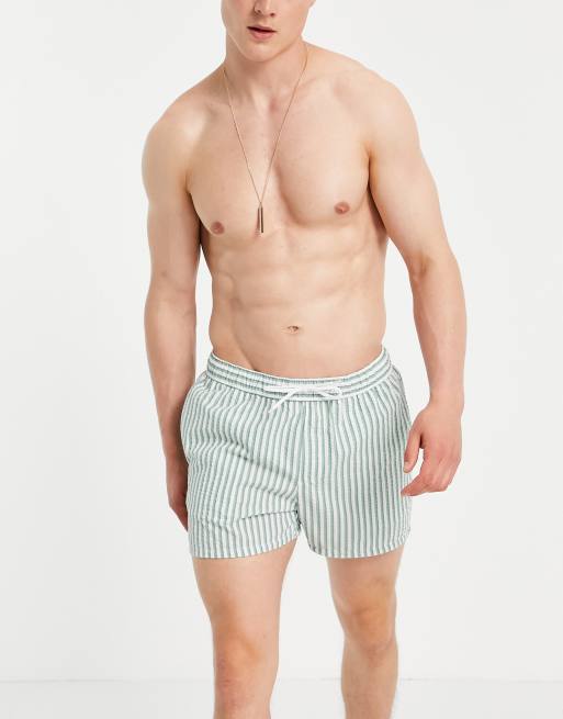 ASOS DESIGN seersucker swim shorts in short length in green stripe | ASOS