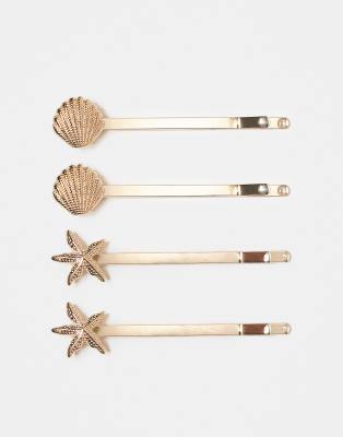 ASOS DESIGN - Set da 4 forcine color oro con conchiglia e stella marina ...
