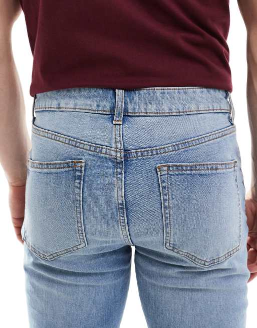 ASOS DESIGN skinny jeans in mid wash blue | ASOS