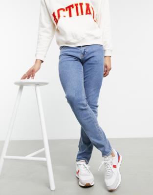 ASOS DESIGN skinny jeans in mid wash blue | ASOS