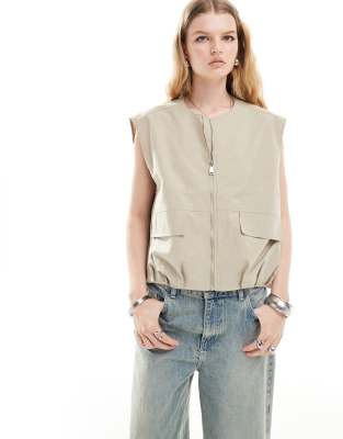 ASOS DESIGN sleeveless collarless utility vest in stone | ASOS
