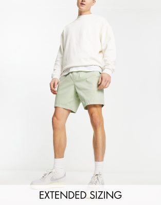 ASOS DESIGN slim chino shorts in mid length in light green | ASOS