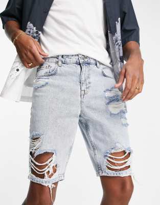 ASOS DESIGN slim denim shorts in light blue wash with heavy rips | ASOS