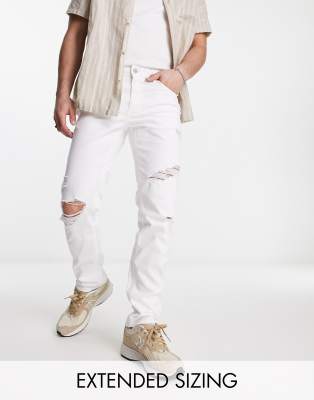 ASOS DESIGN slim jeans with heavy rips in white | ASOS