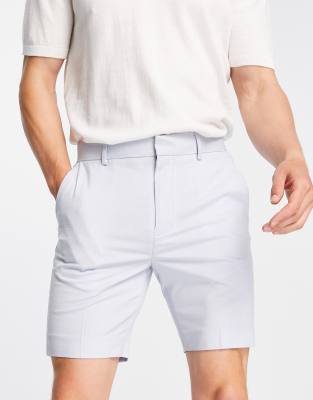 ASOS DESIGN smart skinny shorts with prince of wales check in blue | ASOS