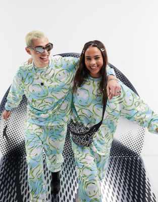 ASOS DESIGN Smiley Collab unisex sweatshirt with Smiley all over print ...