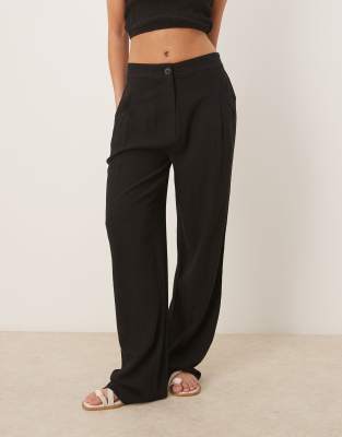 ASOS DESIGN - Sorte tapered bukser med plisseringer foran i hørblanding ...