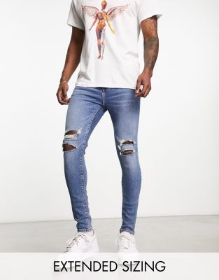 ASOS DESIGN spray on jeans with power stretch in mid wash blue | ASOS