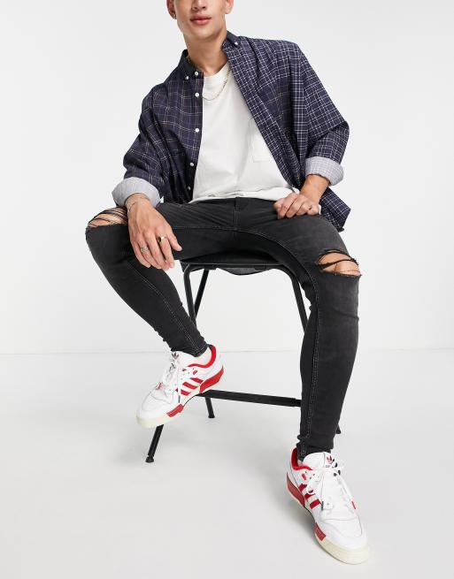 Asos Design Spray On Jeans With Power Stretch In Washed Black With Knee