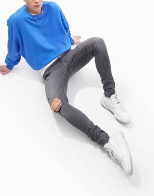 ASOS DESIGN spray on jeans with power stretch in washed black with ...