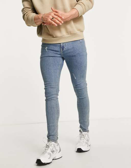 ASOS DESIGN spray on jeans with powerstretch in mid wash | ASOS