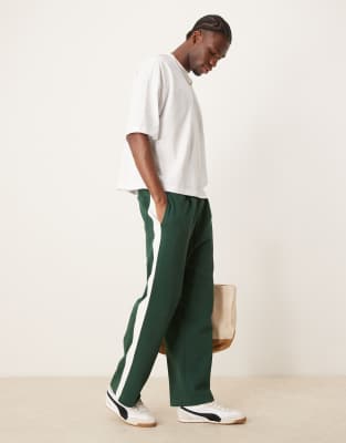 ASOS DESIGN straight leg trackies with side tape detail in green | ASOS