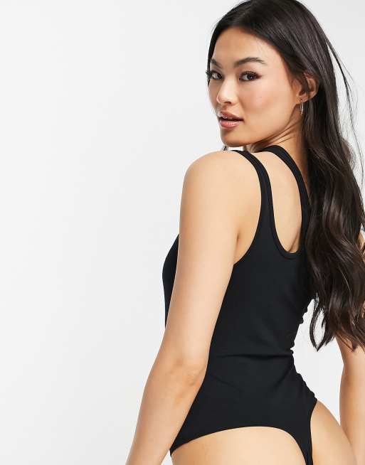 ASOS DESIGN strappy asymmetric cut-out bodysuit in black | ASOS