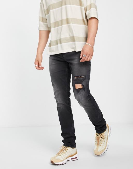ASOS DESIGN stretch slim jeans in washed black with rips | ASOS