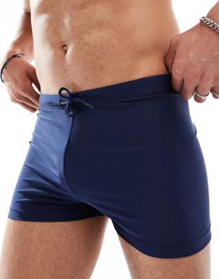ASOS DESIGN stretch swim trunk in navy | ASOS