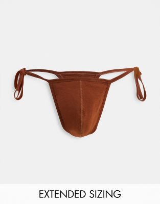 ASOS DESIGN - String ton sur ton avec liens à nouer sur les côtés | ASOS