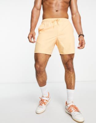 ASOS DESIGN swim shorts in mid length in peach | ASOS