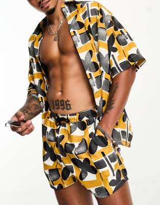 ASOS DESIGN swim shorts in short length in abstract floral print - part ...