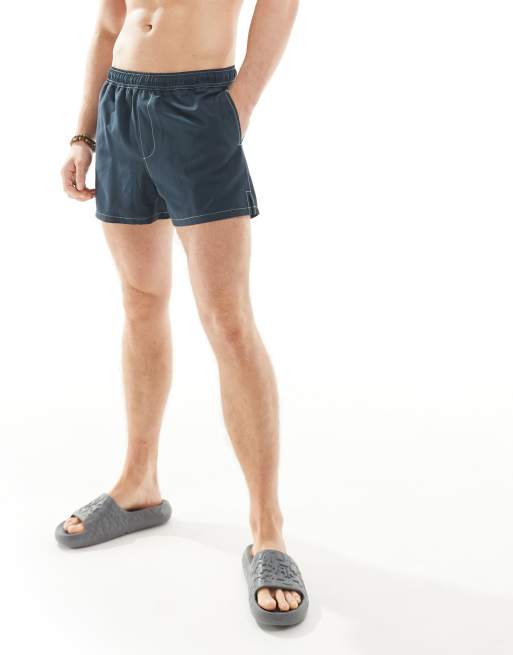 ASOS DESIGN swim shorts in short length with contrast stitch detail in ...