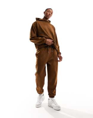 ASOS DESIGN tapered jogger in seudette texture in brown | ASOS