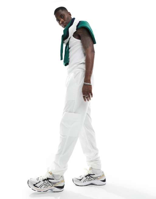 ASOS DESIGN tapered pull on cargo trackies in white | ASOS