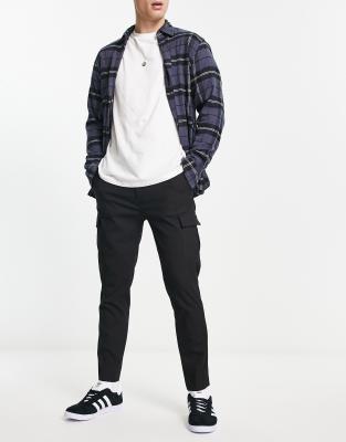 ASOS DESIGN tapered smart pants with cargo pockets in black | ASOS