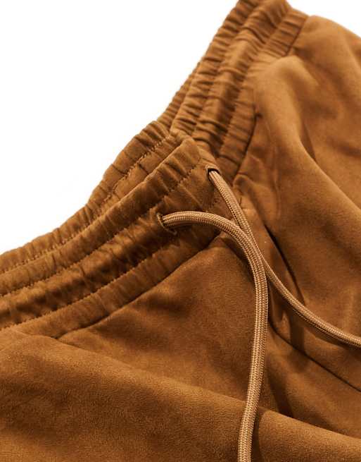 ASOS DESIGN tapered trackies in suedette texture in brown | ASOS