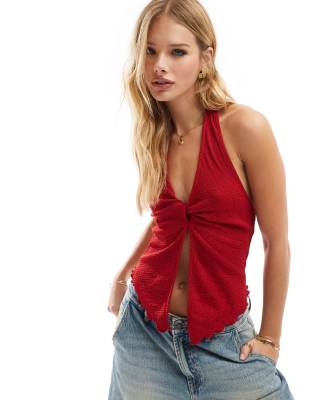 ASOS DESIGN textured halter twist front top in red | ASOS