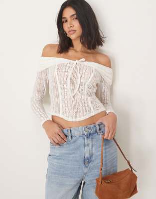 ASOS DESIGN - Top manches longues en dentelle avec épaules dénudées et détail noué - Ivoire | ASOS